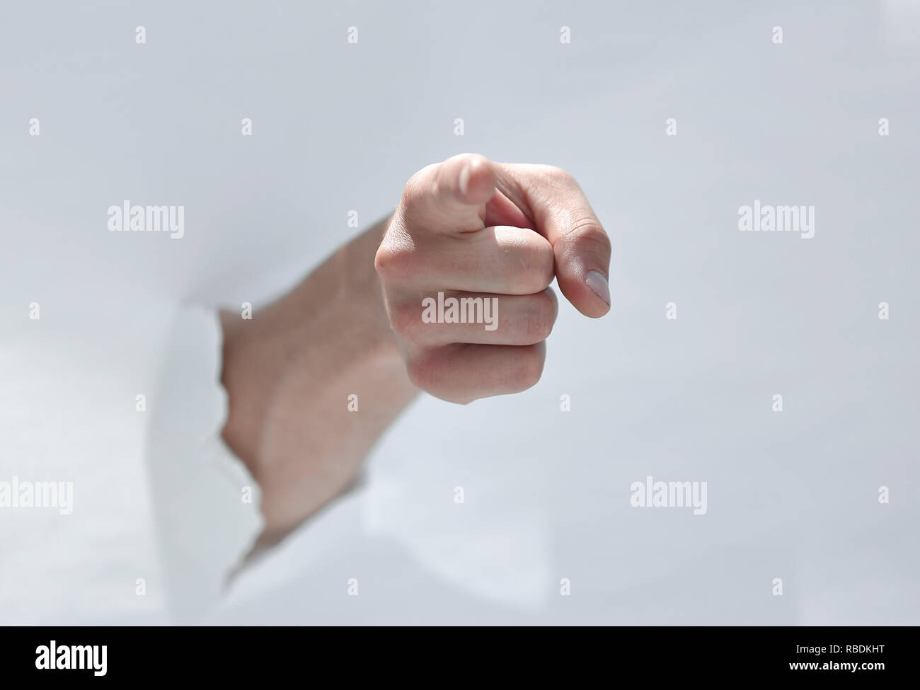 hand breaking through the paper and pointing at you Stock Photo - Alamy