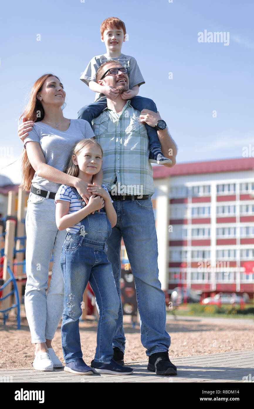 in full growth.happy family with children standing together Stock Photo ...