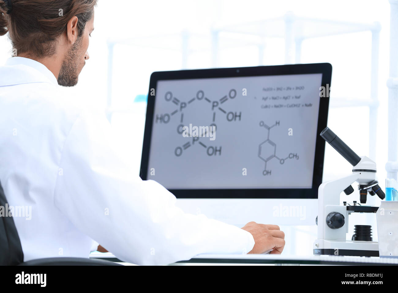 research scientist using computer chemistry laboratory Stock Photo - Alamy