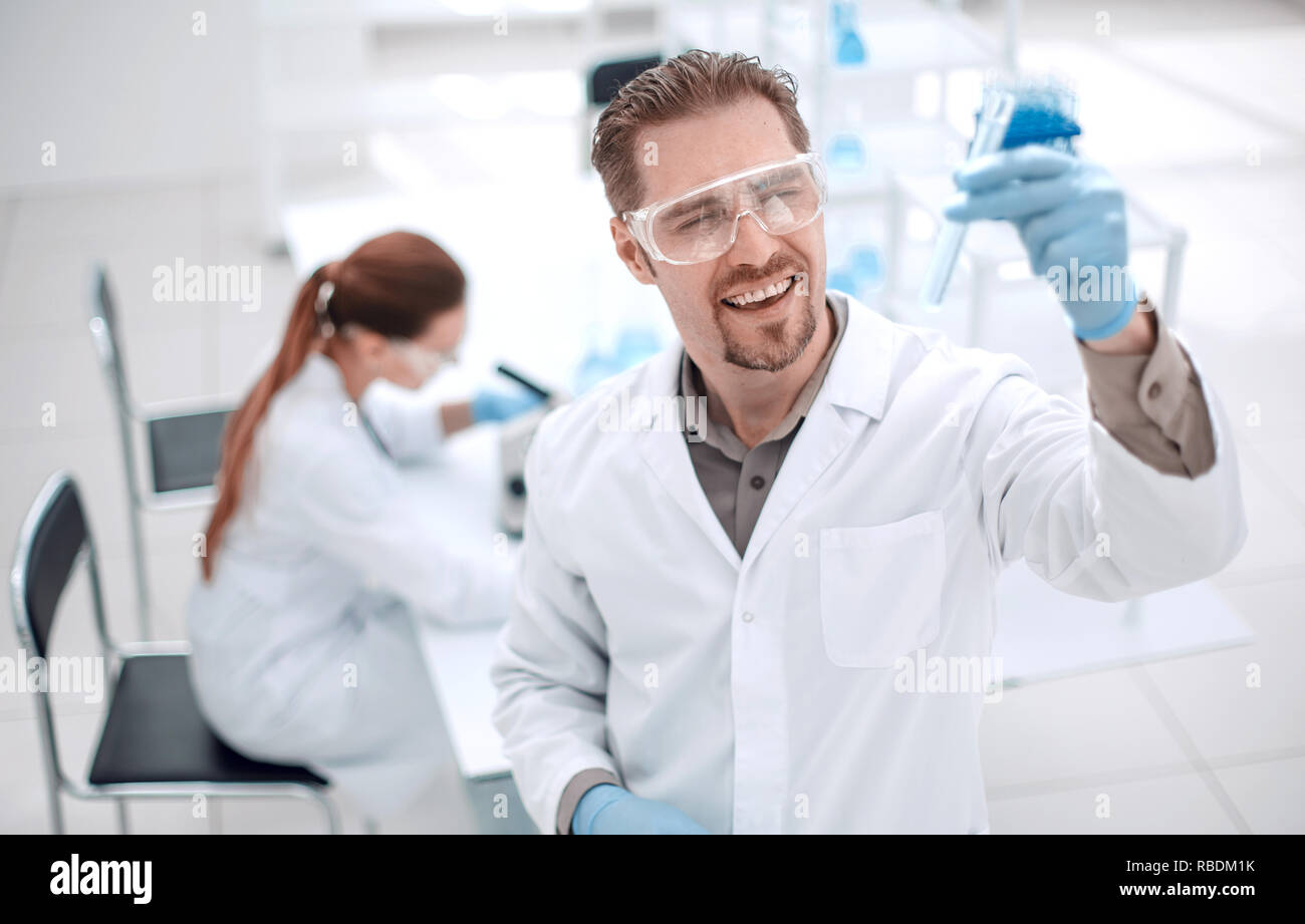 successful scientist checking the results of the examination Stock ...