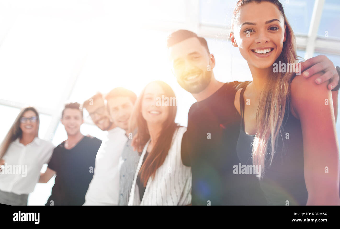 smiling business team standing in the new office.the concept of ...