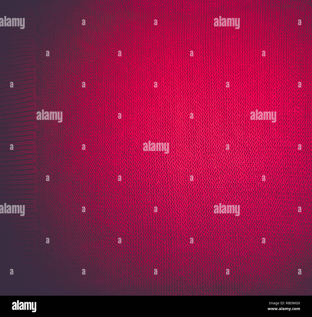 Red Knitted pattern wool sweater texture close up. Handmade red ...