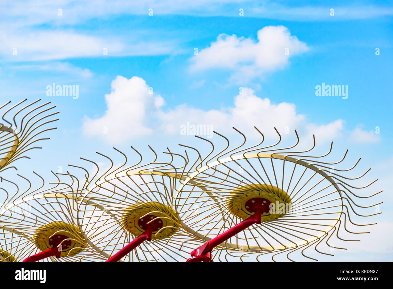 Side delivery rakes or Carted wheel rakes lifted off the ground against ...