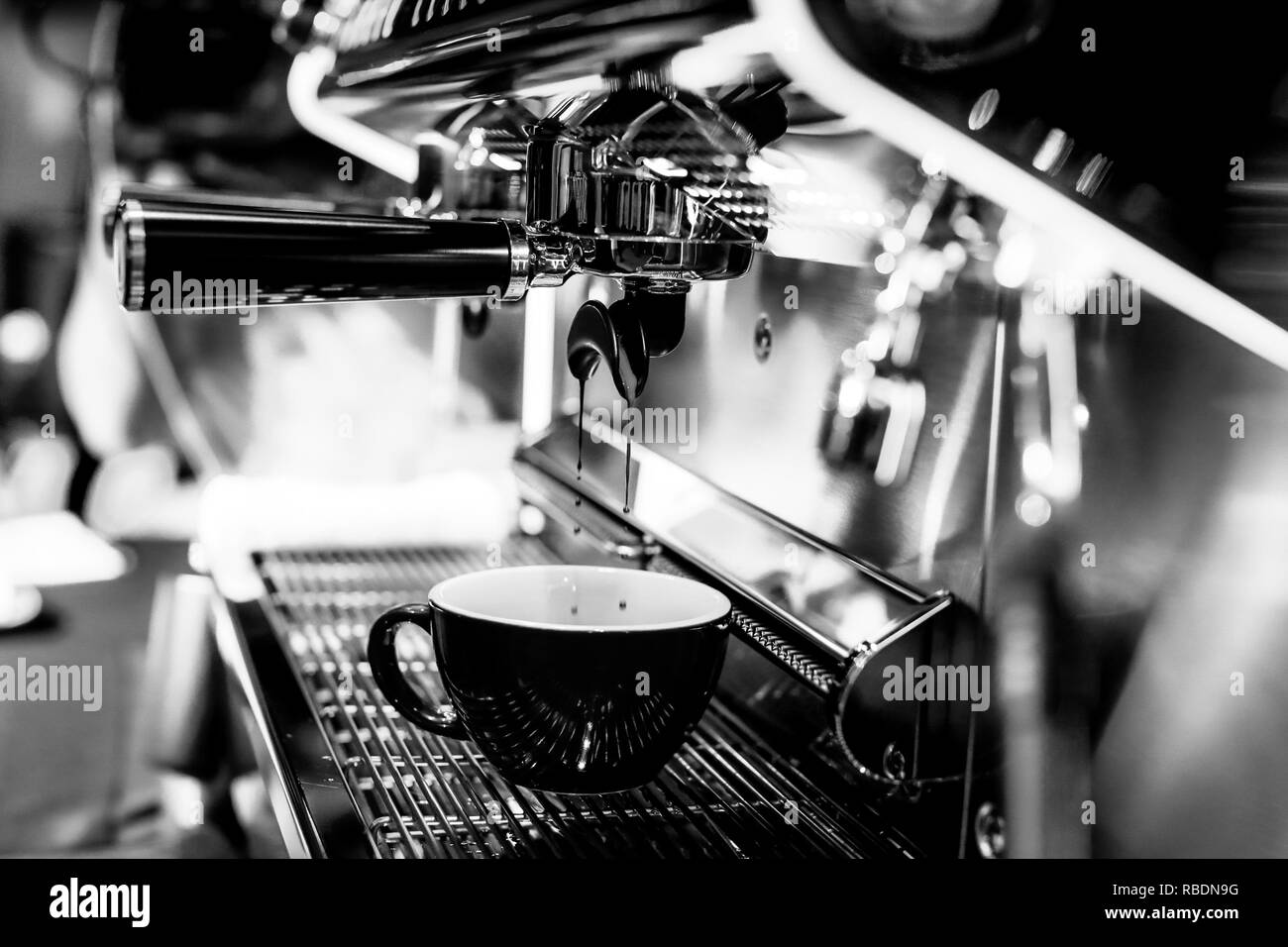 espresso shot from coffee machine in coffee shop, Coffee maker in ...
