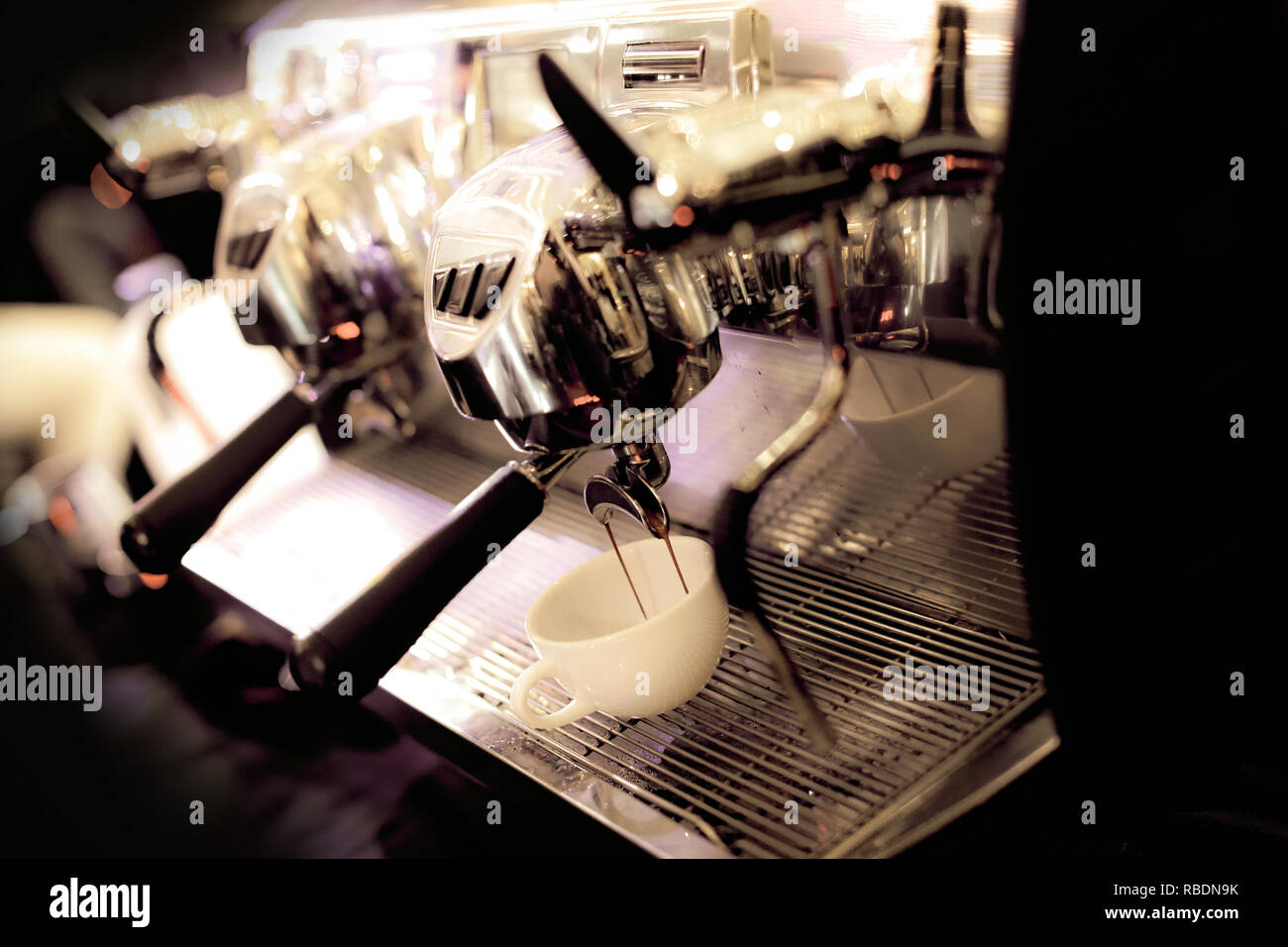 espresso shot from coffee machine in coffee shop, Coffee maker in ...