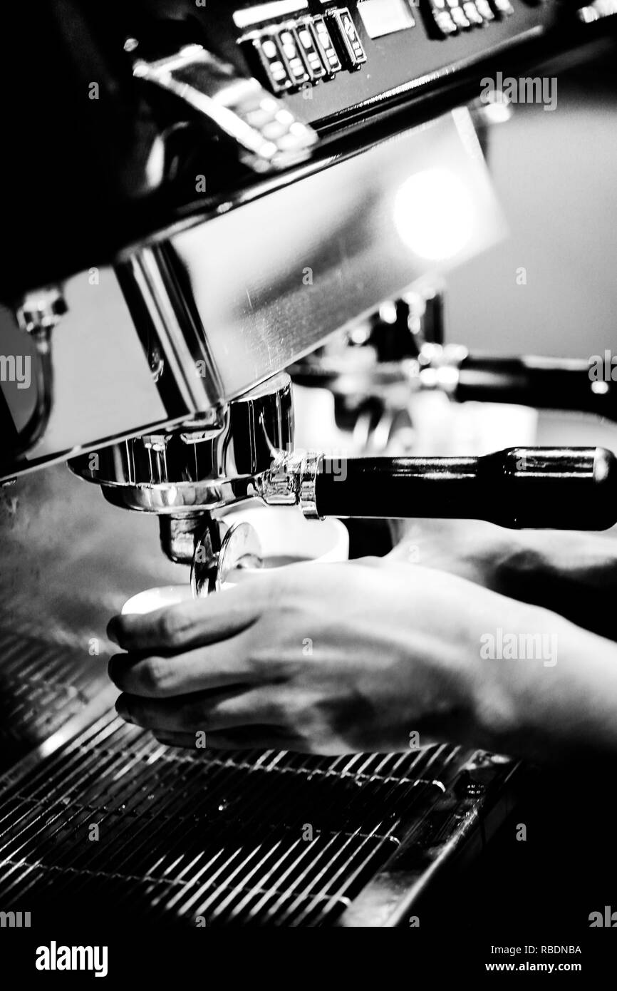 espresso shot from coffee machine in coffee shop, Coffee maker in ...