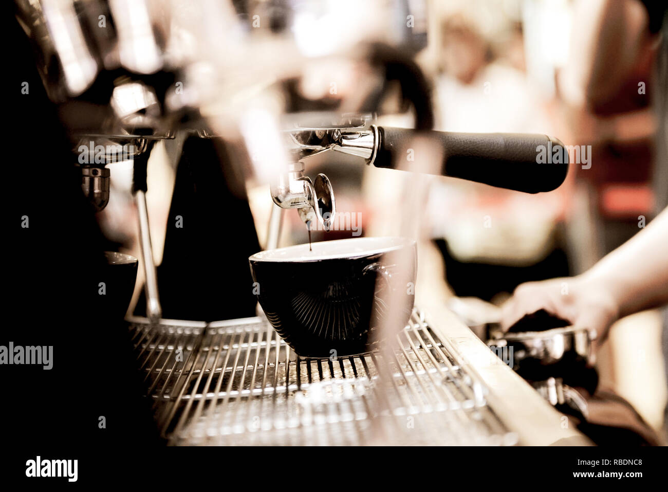 espresso shot from coffee machine in coffee shop, Coffee maker in ...