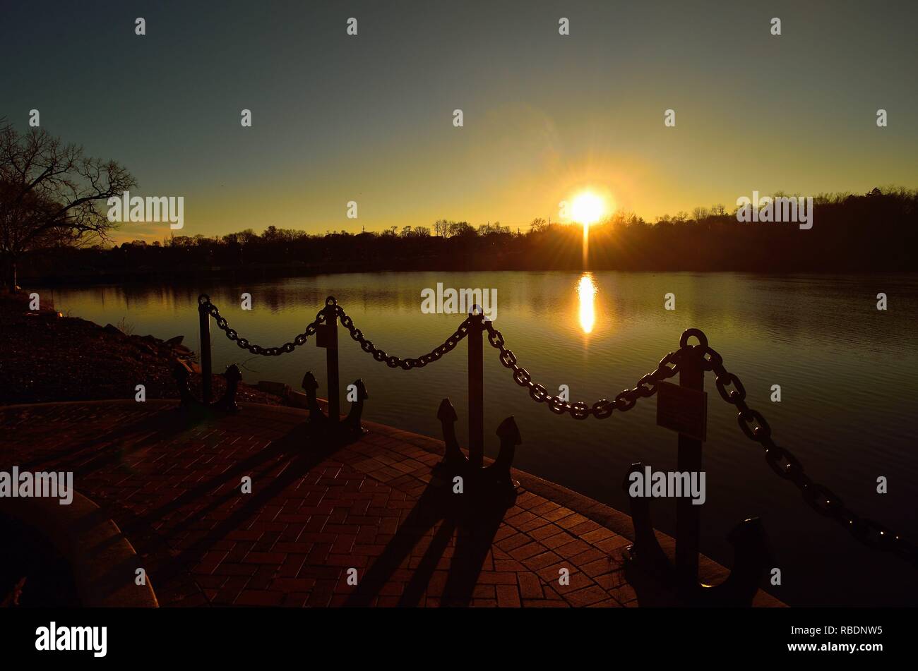 Elgin, Illinois, USA. Sunset reflecting on the Fox River as seen ...