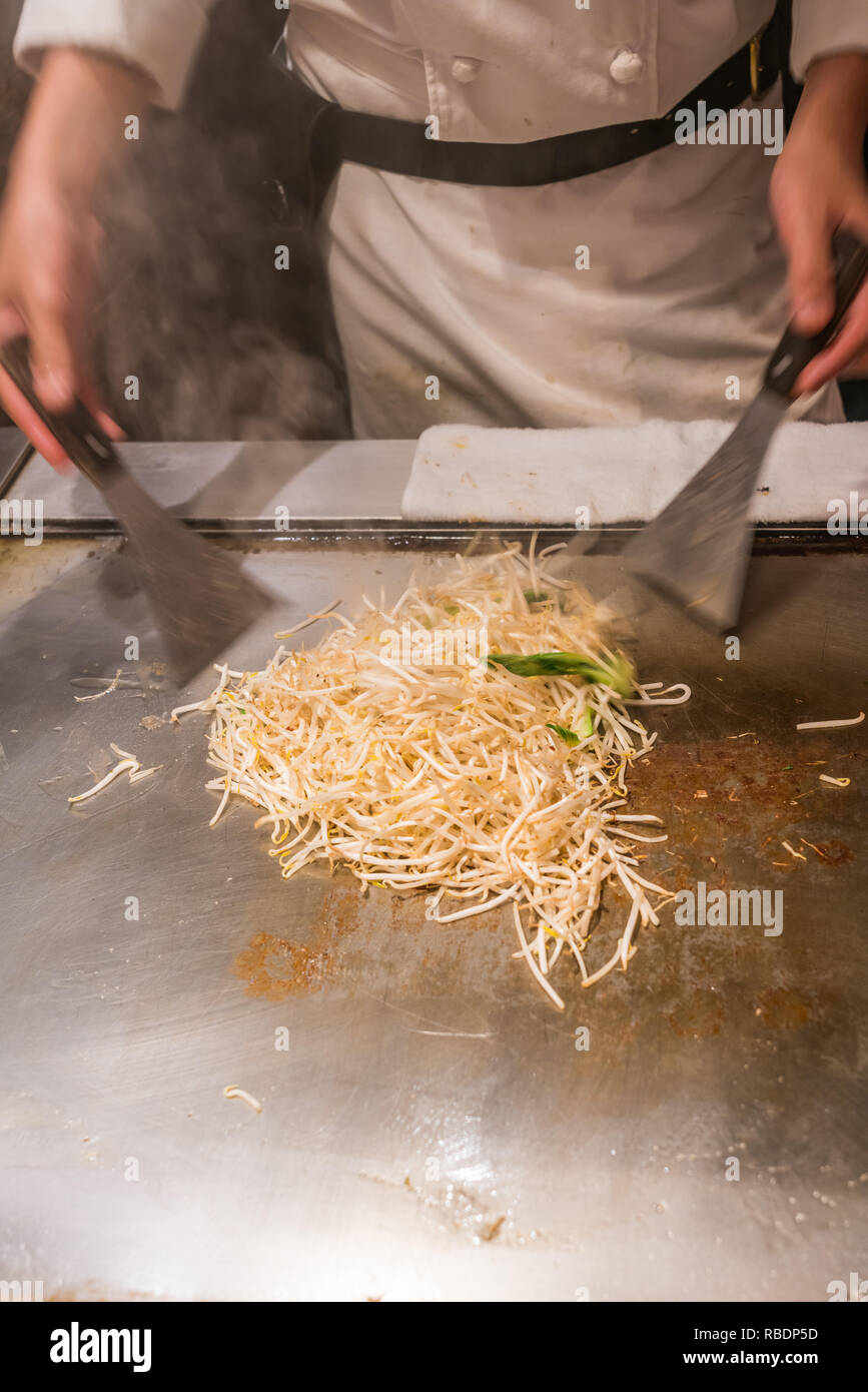 Chef cooking vegetables at the restaurant Stock Photo - Alamy
