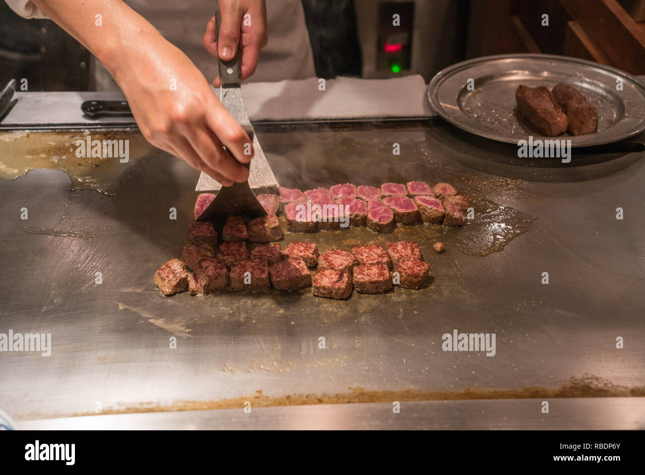Chef hand cook Wagyu Kobe beef steak Stock Photo - Alamy