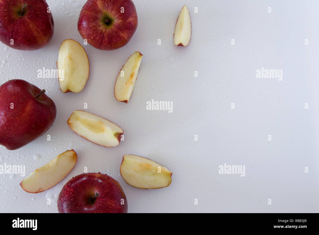 Top view of crispy red apples on white background, space for text ...