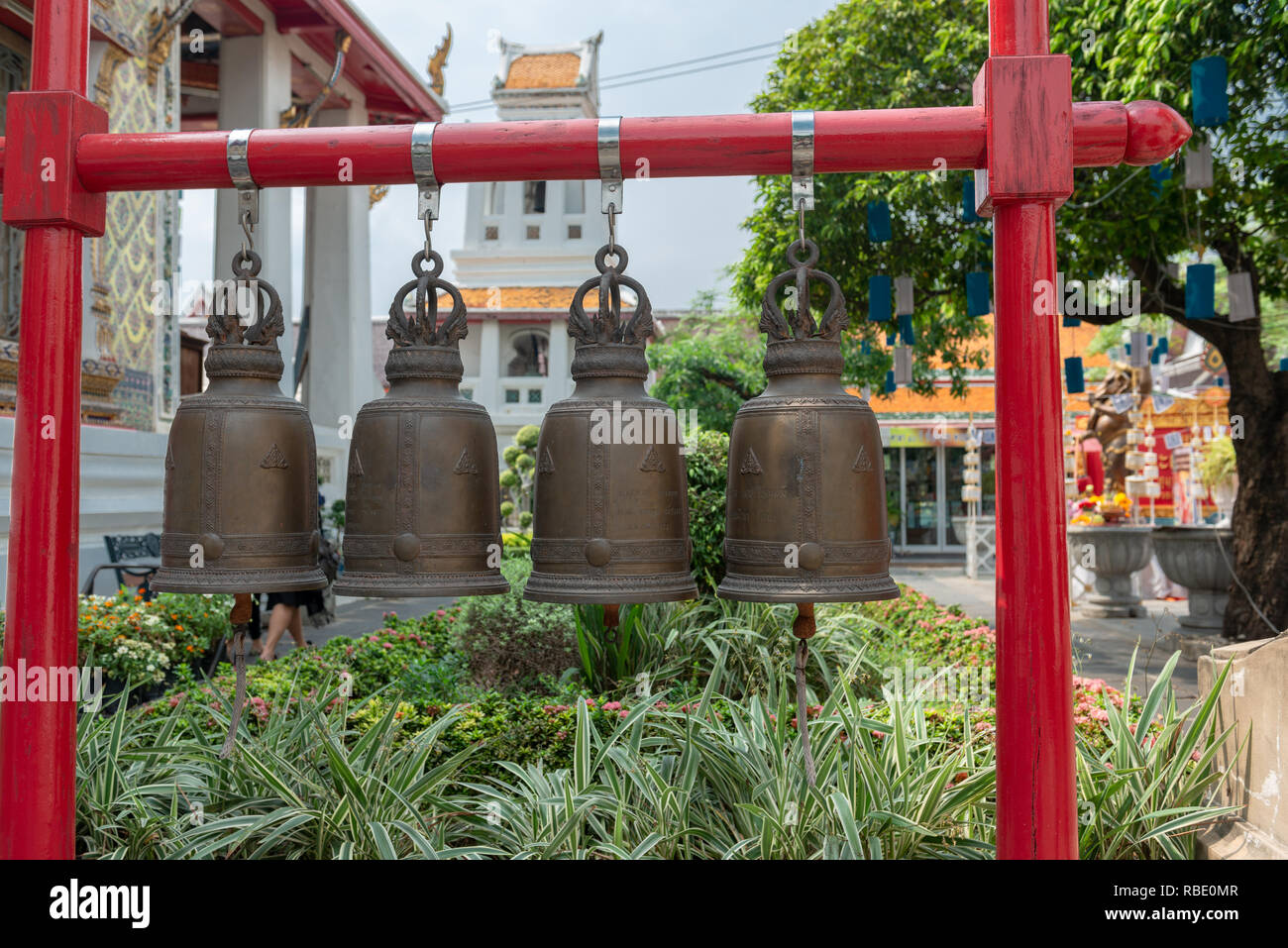 Bells on the red frame Stock Photo - Alamy