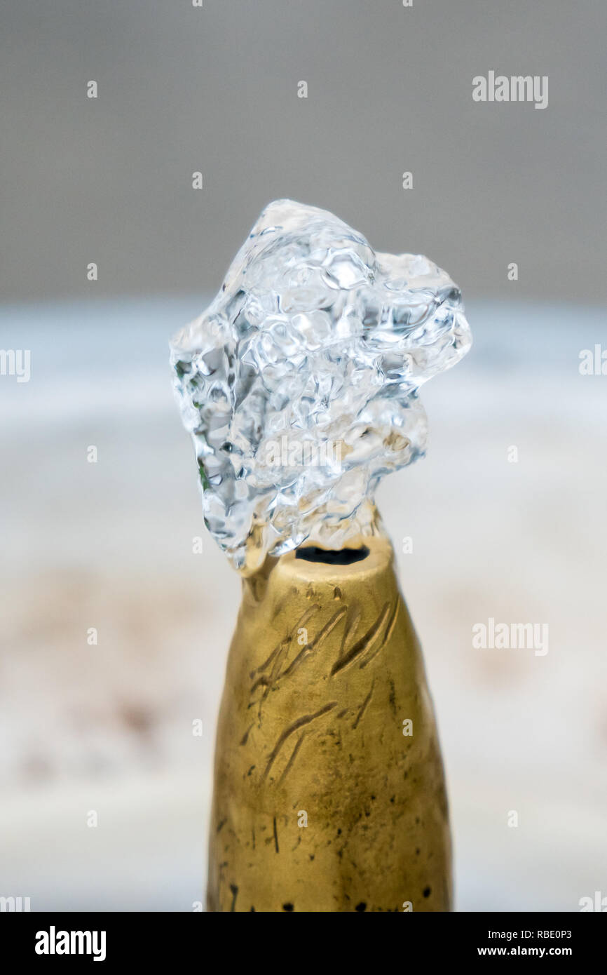 Close up water drops flowing from fountain Stock Photo - Alamy