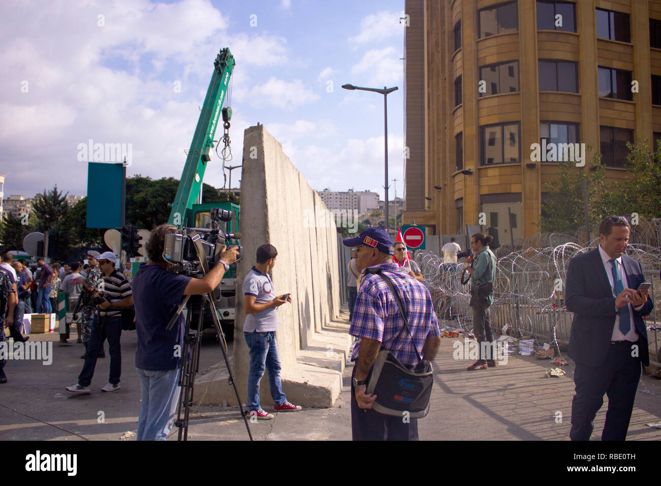 Lebanese protests. People construct concrete and wire barricades went ...