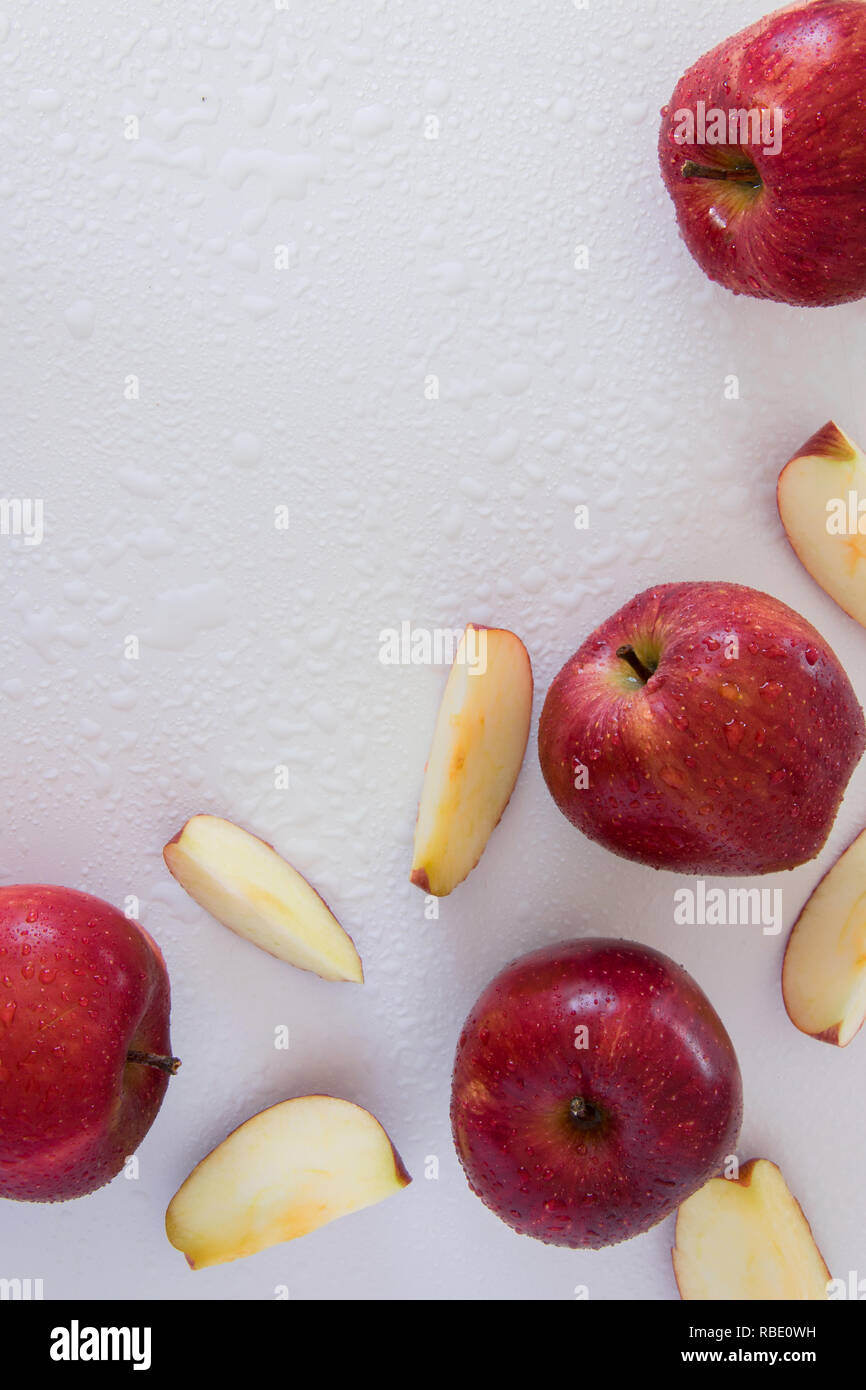 Top view of crispy red apples on white background, space for text ...
