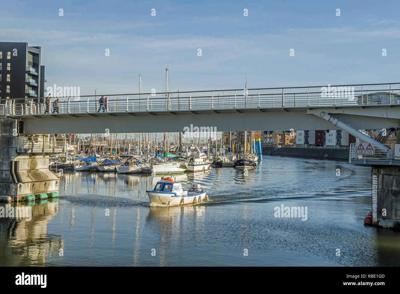 The River Ely coming into Cardiff Bay lined with apartments and full of ...