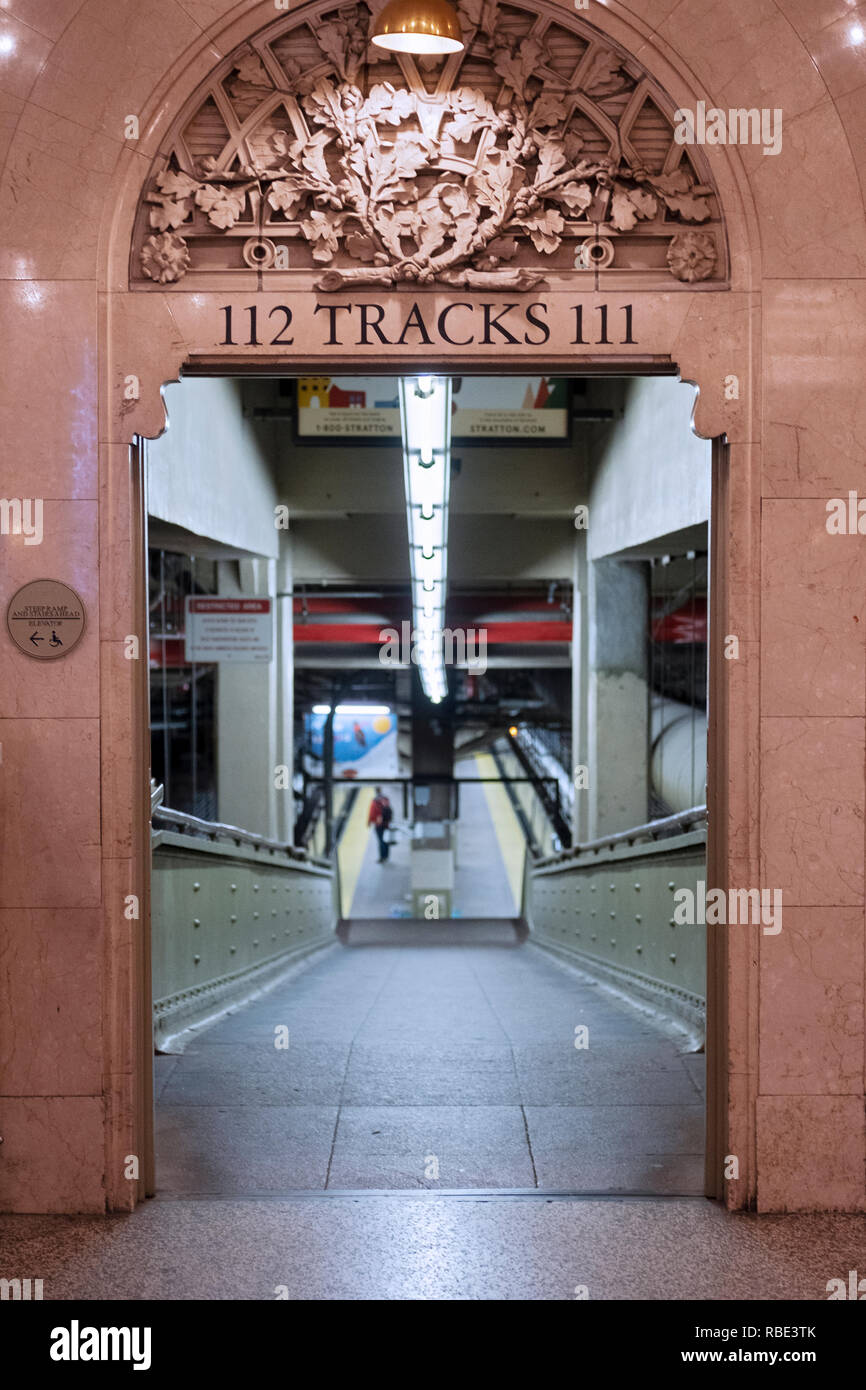 A commuter heads down to the Metro North tracks for the evening commute ...