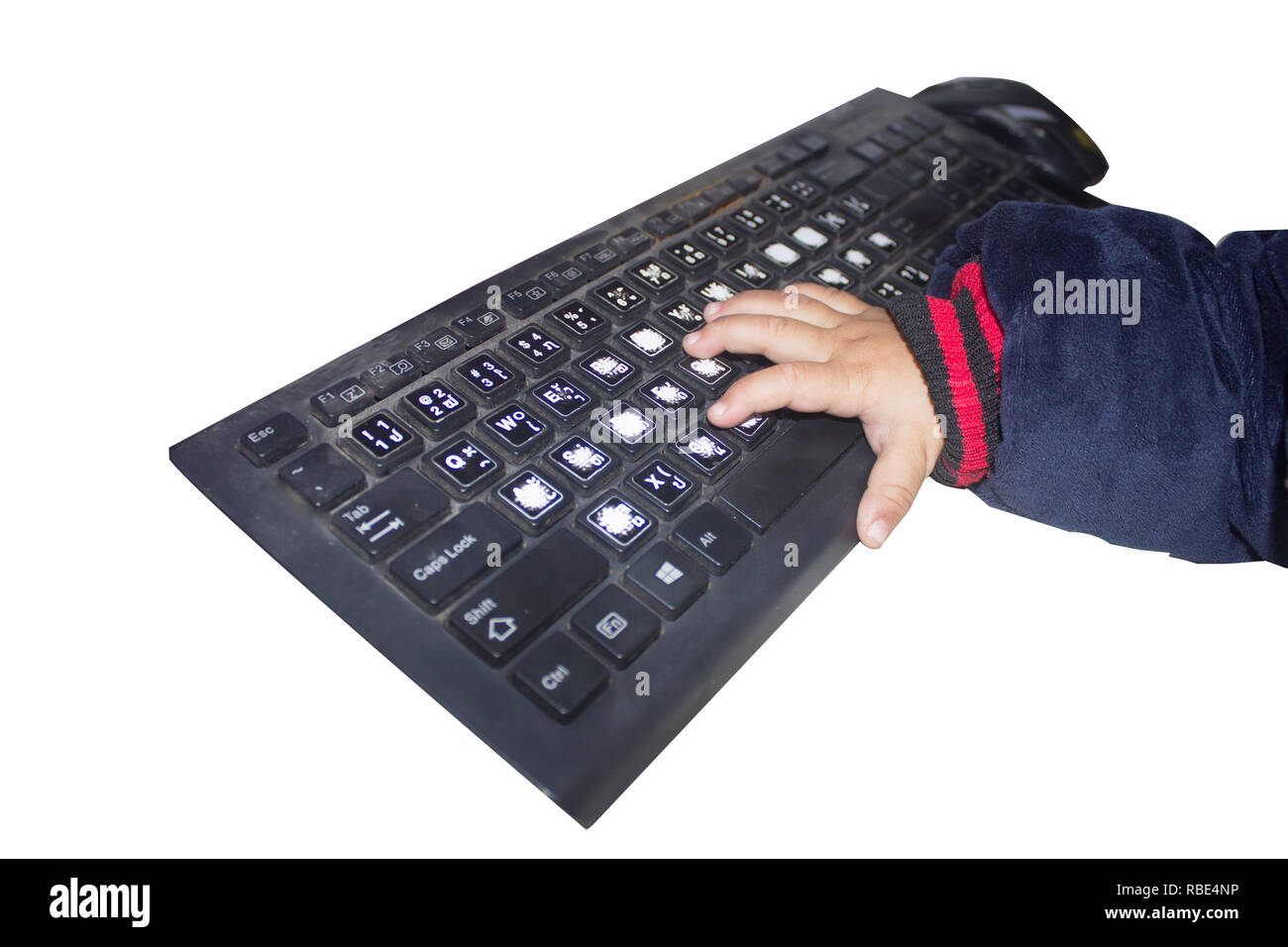 small boy using computer keyborad one hand on keyboard with isolated or ...