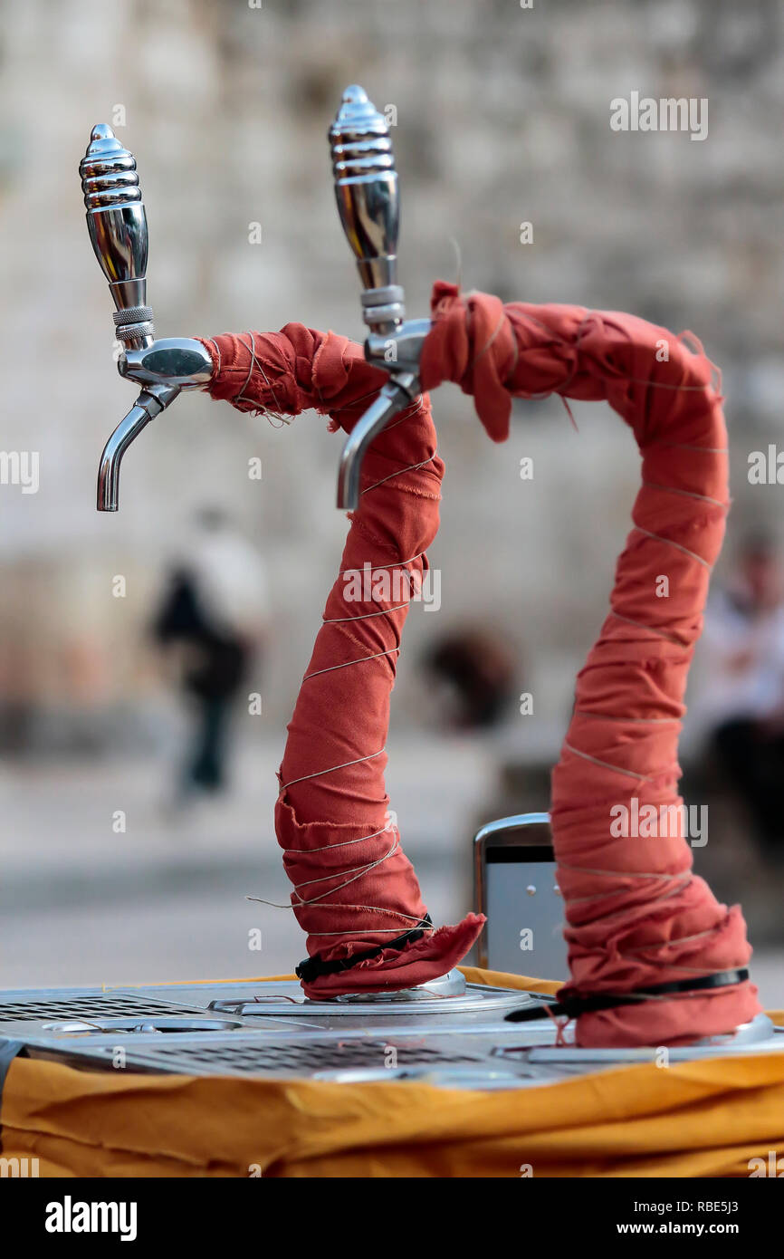 vertical view of two beer taps of an outdoor bar Stock Photo - Alamy