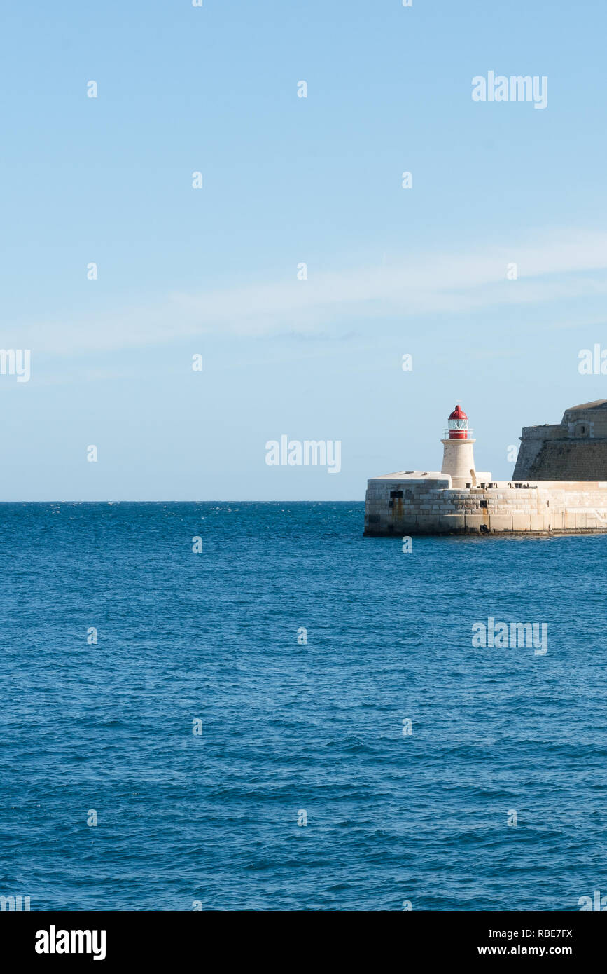 A short and colourful lighthouse situated on the breakwater opposite ...