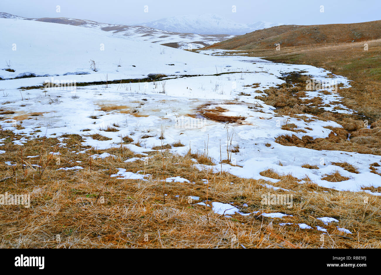 Snowy steppe at the mountains Stock Photo - Alamy