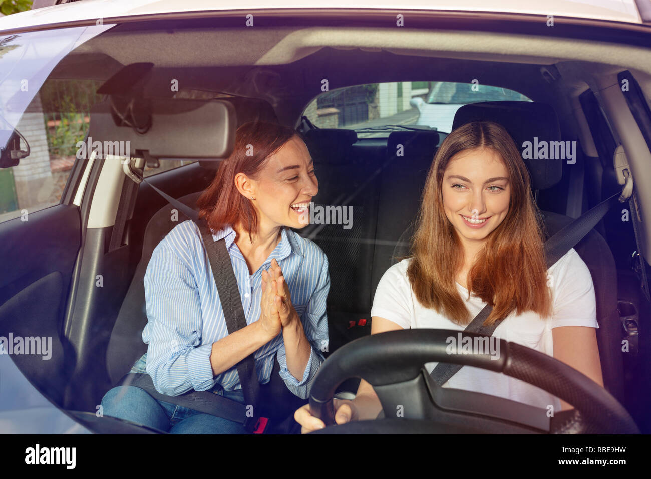 Portrait of beautiful Caucasian women in car Stock Photo - Alamy