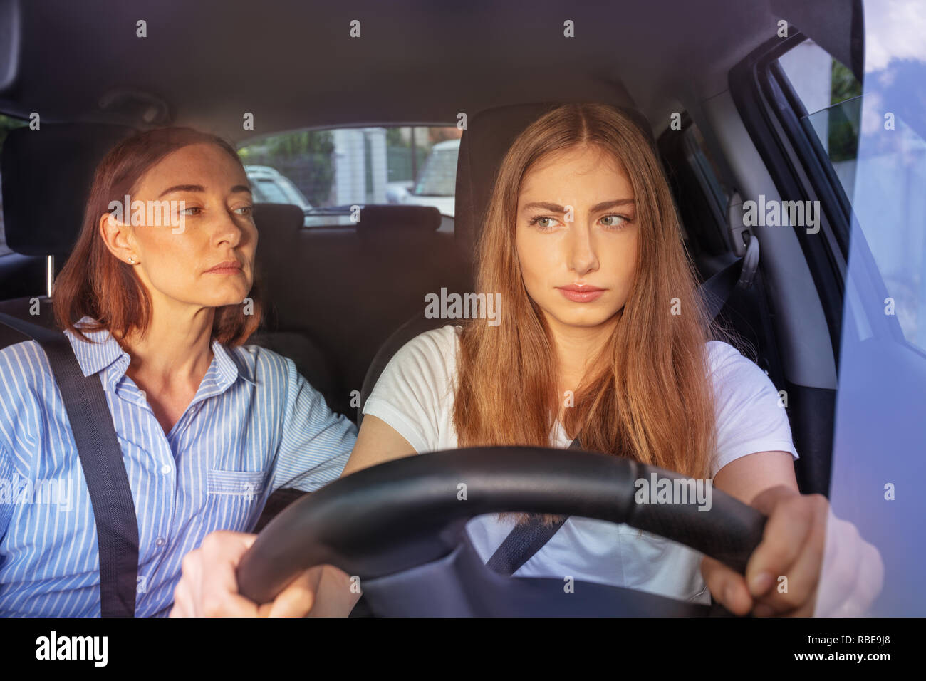 Teenage girl during driving lesson in a car Stock Photo - Alamy
