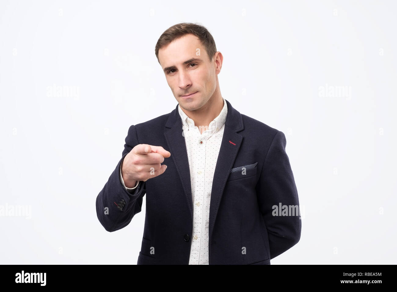 angry man in suit pointing his finger accusing someone Stock Photo - Alamy