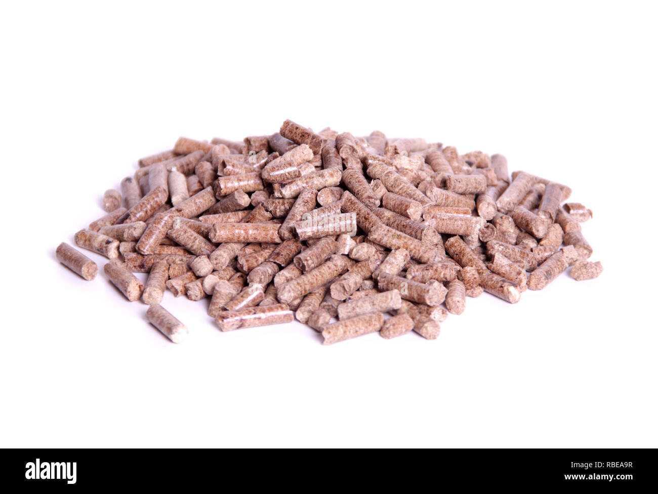 Pile of wood pellets Cut Out Stock Images & Pictures - Alamy