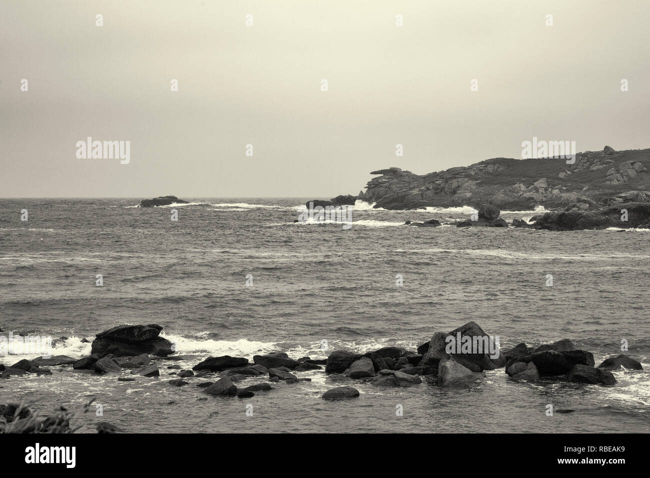 Old Town Bay and Pulpit Rock, St. Mary's, Isles of Scilly, UK. Black ...