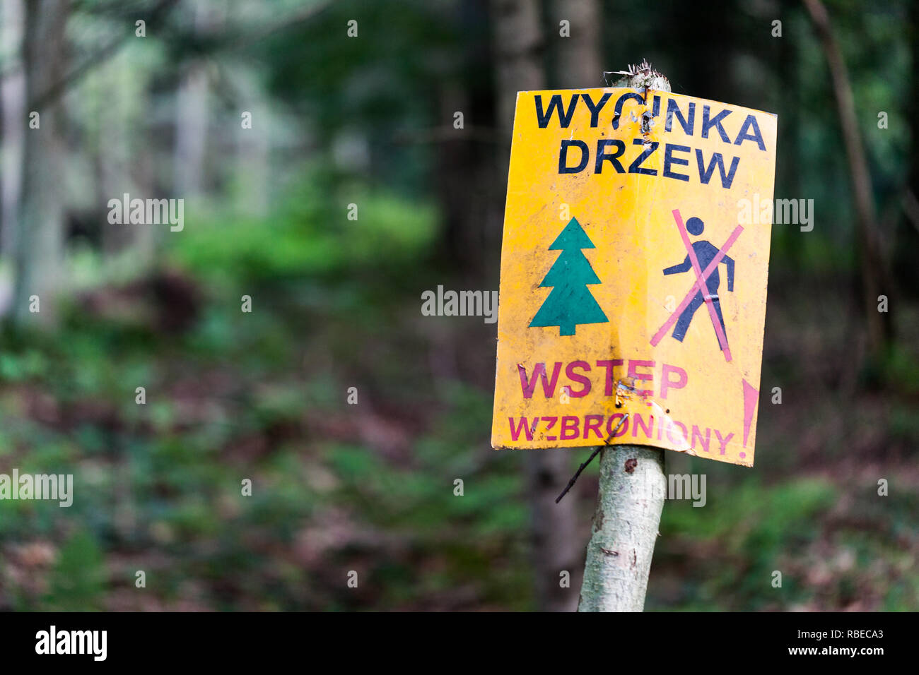 Metal plate sign with Polish language. Forbiden entry and forbiden ...