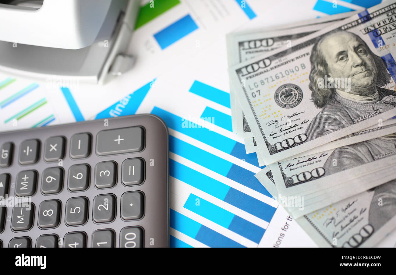 Silver calculator with gray keyboard is lying Stock Photo - Alamy