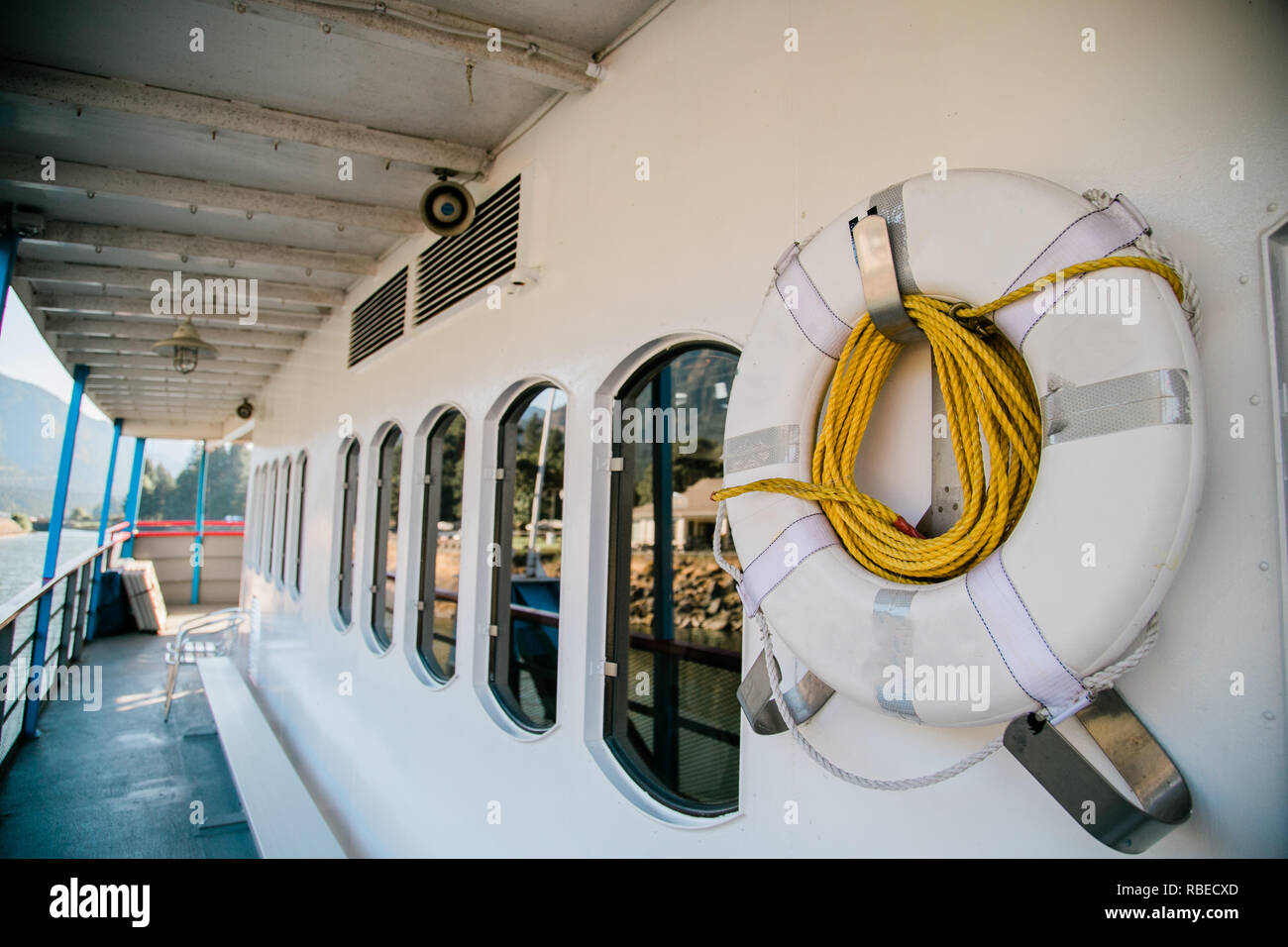 side of large boat holding a life preserver Stock Photo - Alamy