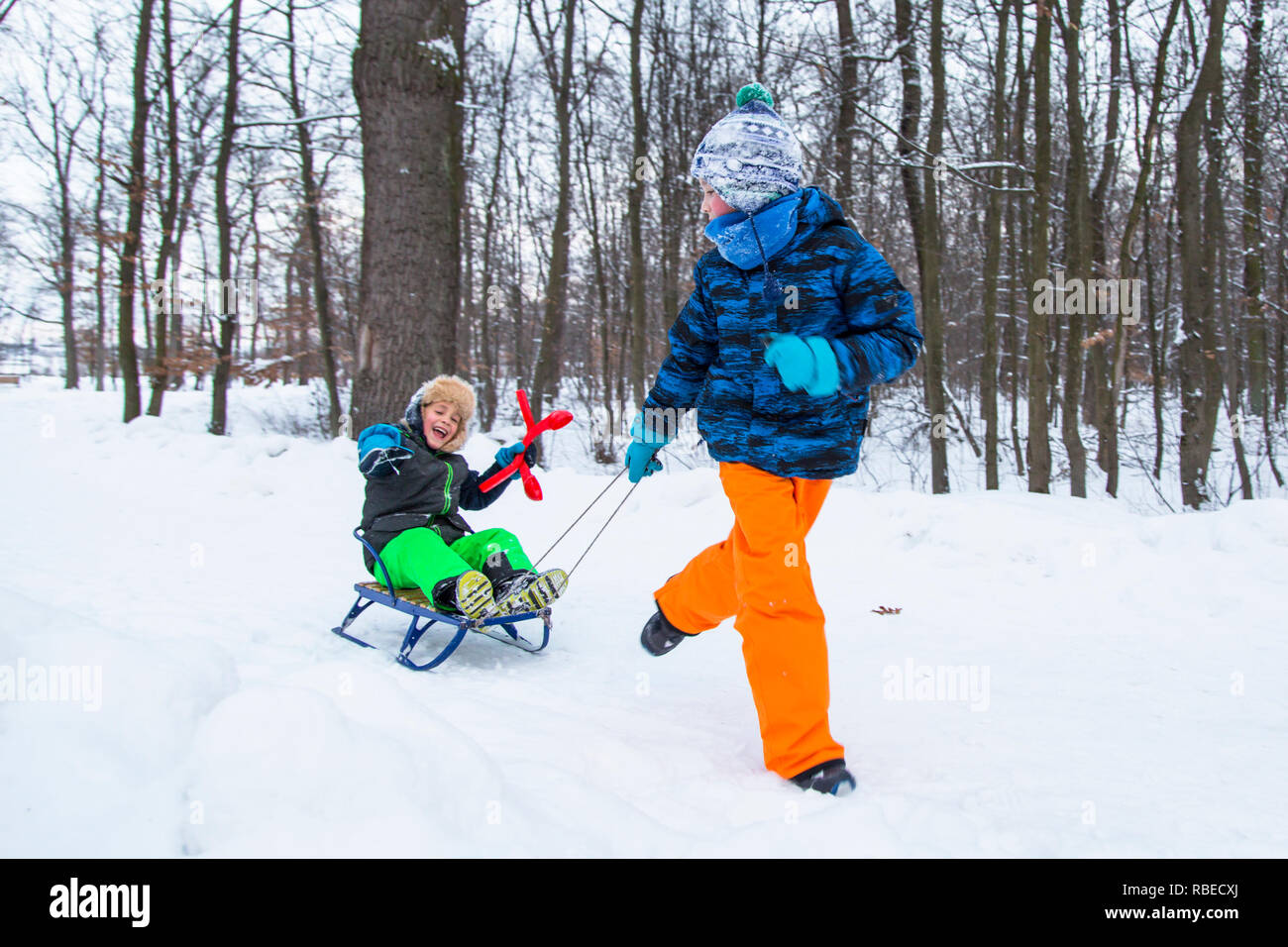 Two boys playing forest hi-res stock photography and images - Alamy