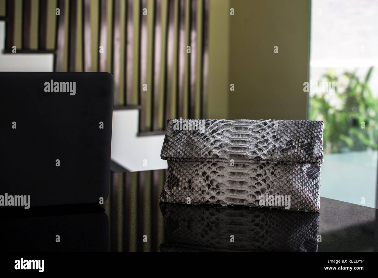 Computer with handbag. Shopping and business concept. Top view, leather ...