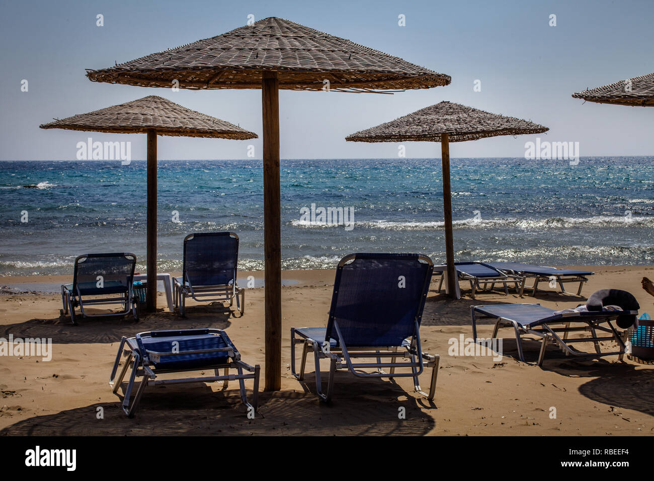 Beach Adjustable Lounge Chair Bed Facing the Ocean. Wooden Umbrella ...