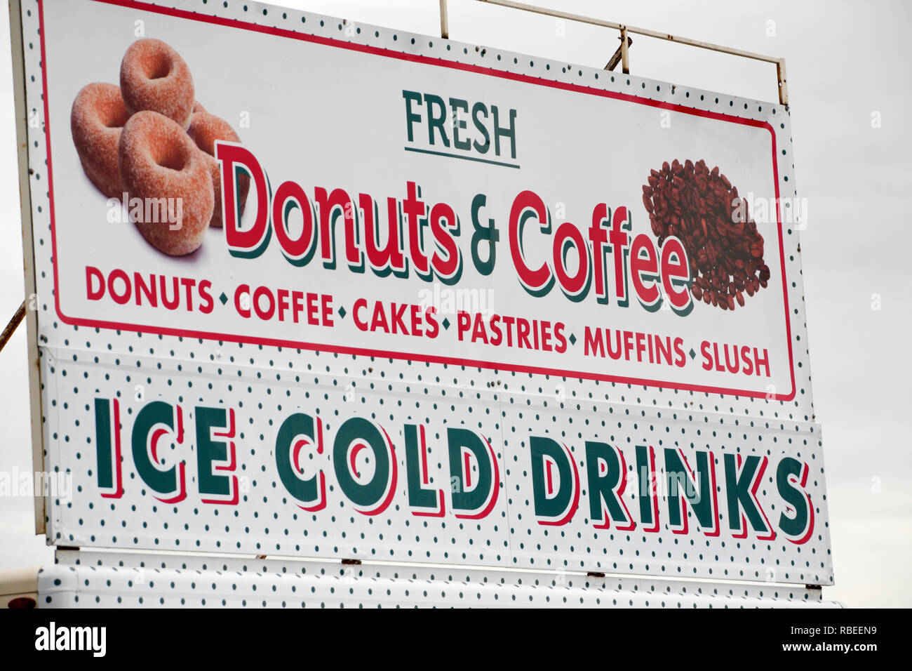 Fresh Donuts and Coffee sign at Highland Games Stock Photo - Alamy