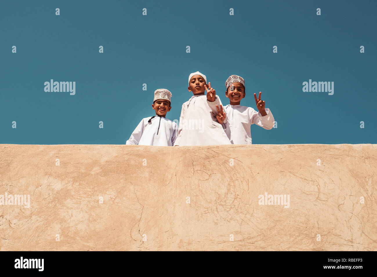 Candid portrait of a cute omani kid in Nizwa Stock Photo - Alamy