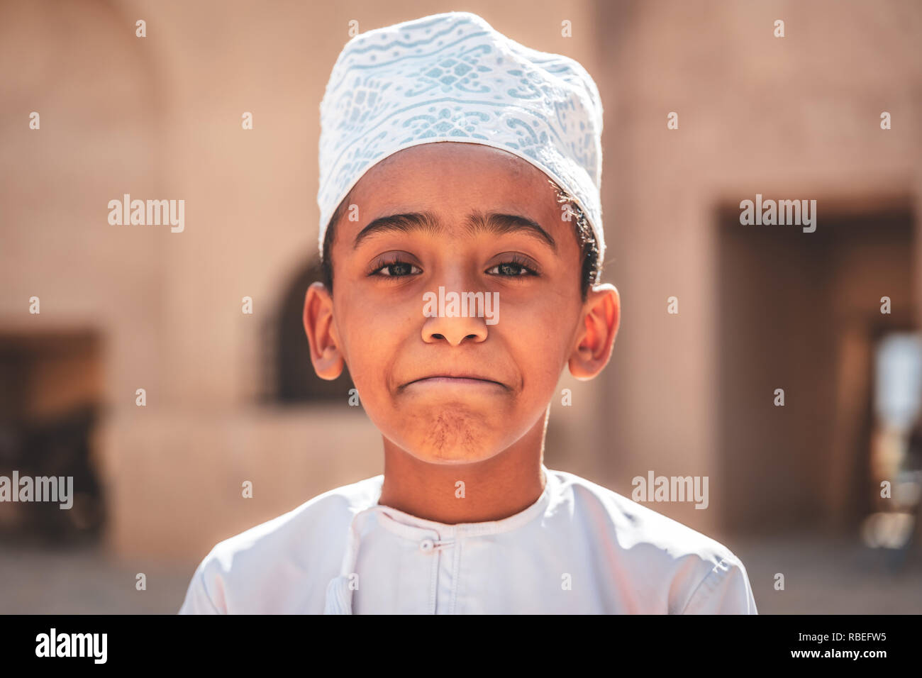 Candid portrait of a cute omani kid in Nizwa Stock Photo - Alamy