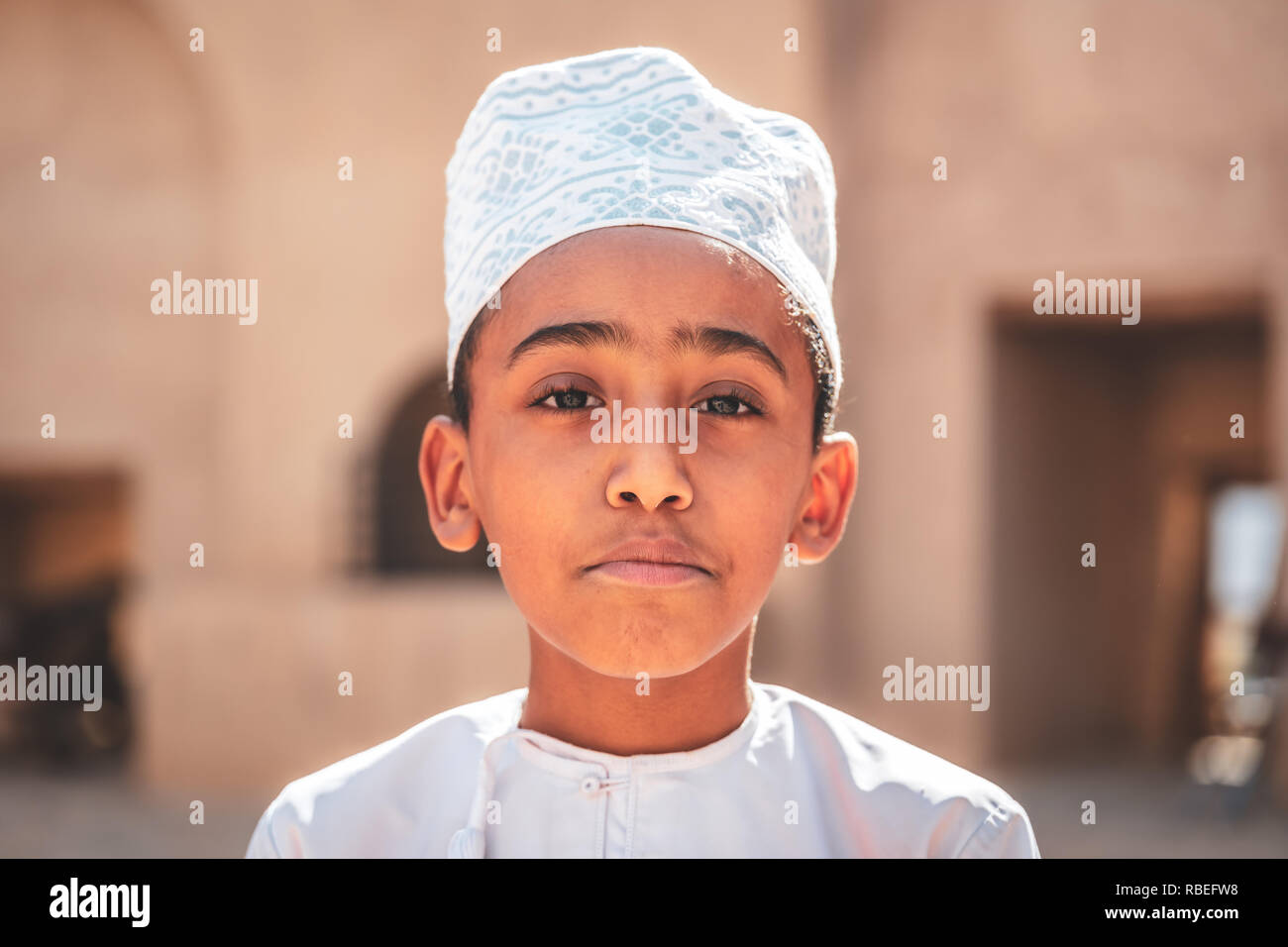 Candid portrait of a cute omani kid in Nizwa Stock Photo - Alamy
