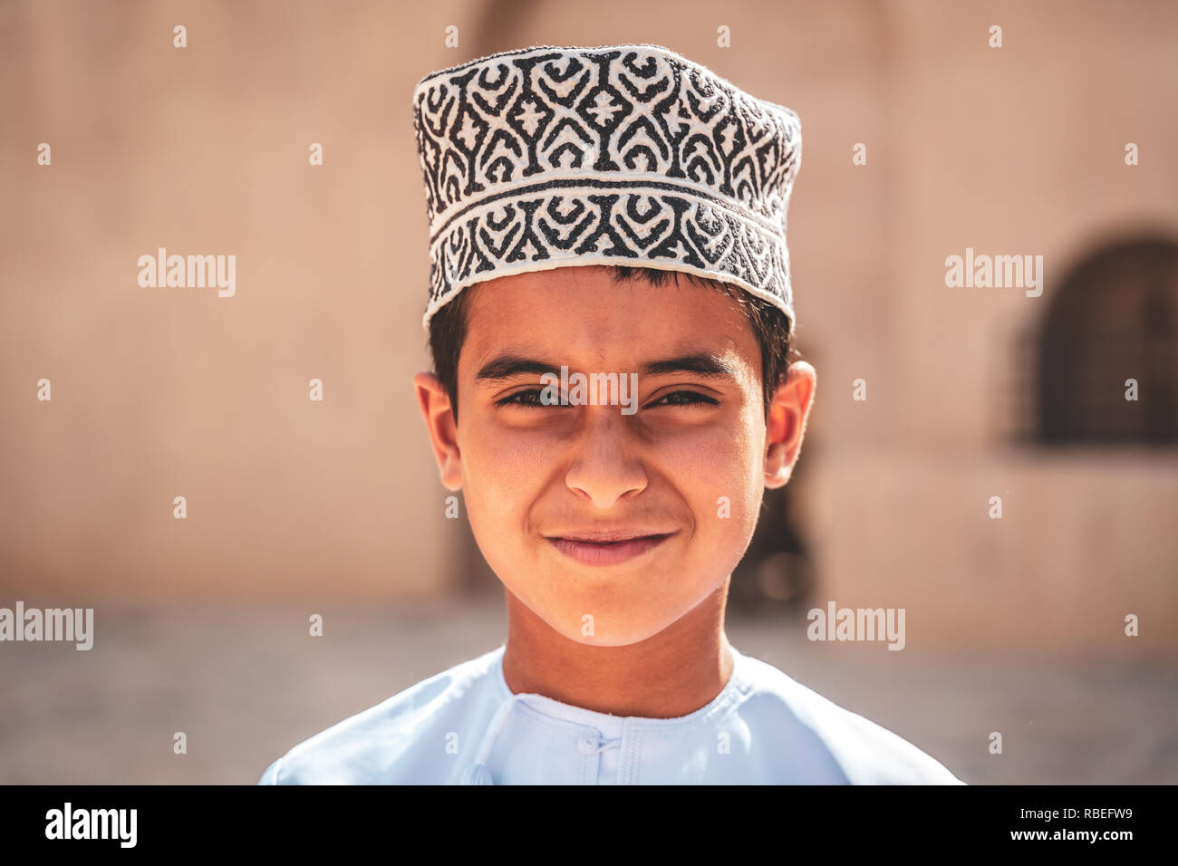 Candid portrait of a cute omani kid in Nizwa Stock Photo - Alamy