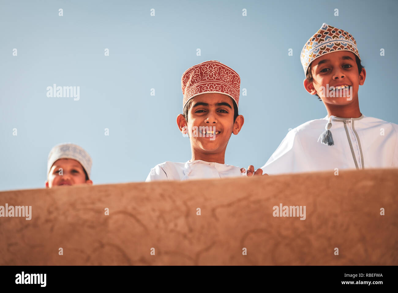 Candid portrait of a cute omani kid in Nizwa Stock Photo - Alamy
