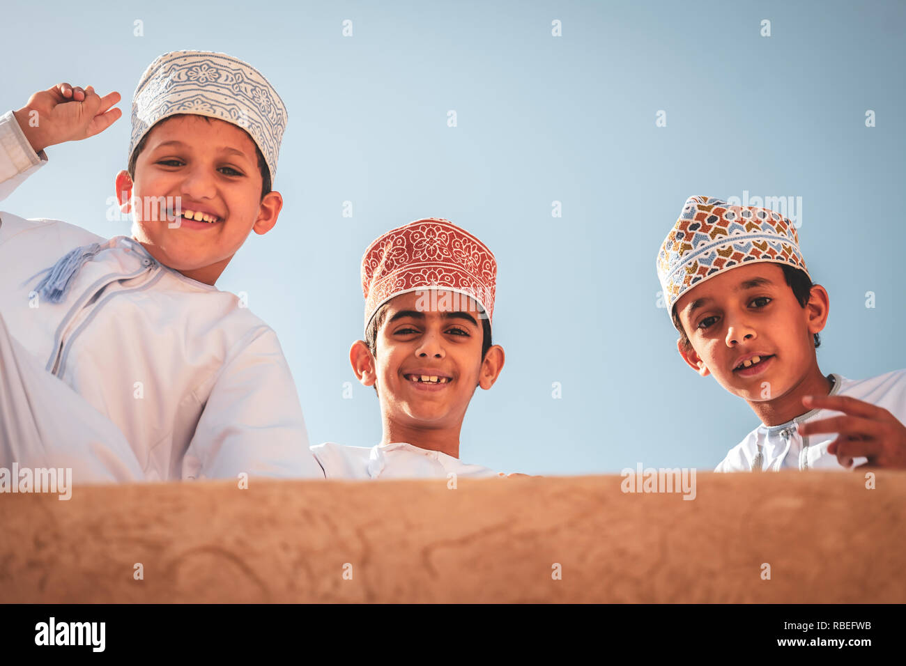 Candid portrait of a cute omani kid in Nizwa Stock Photo - Alamy