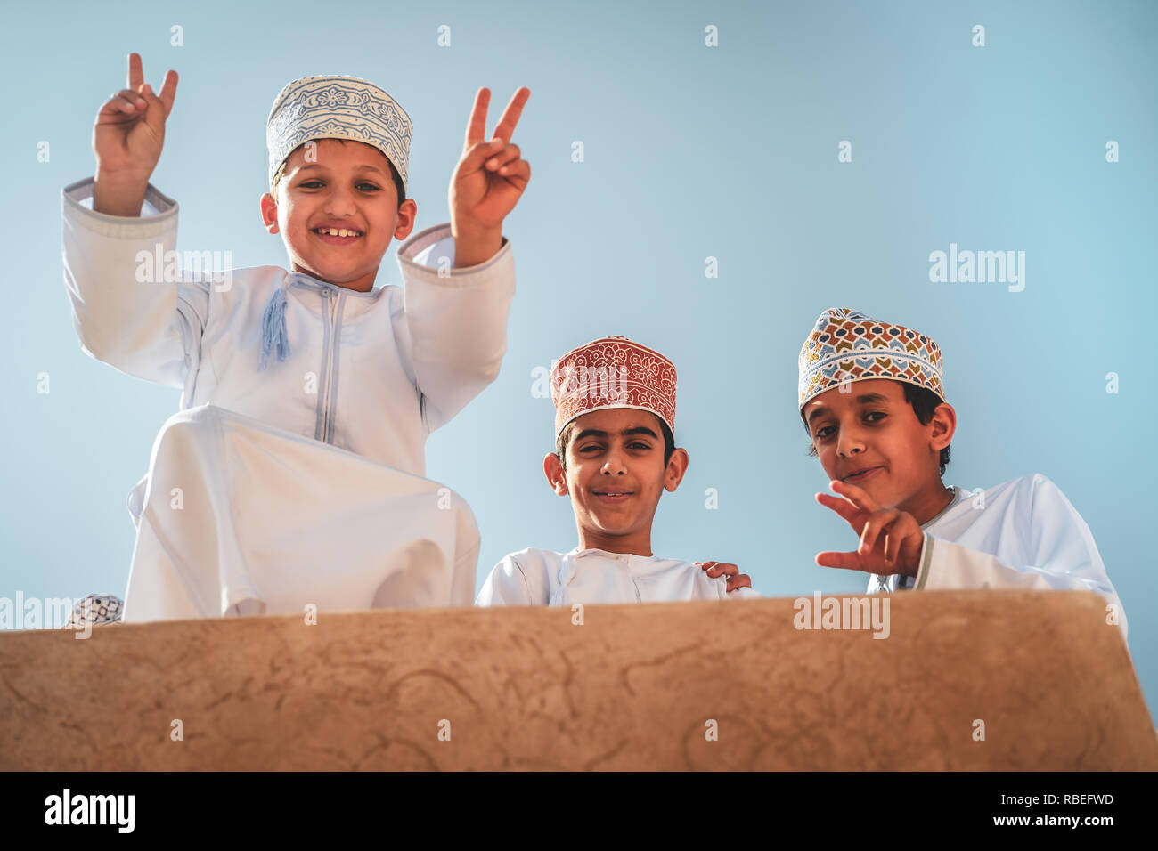 Candid portrait of a cute omani kid in Nizwa Stock Photo - Alamy