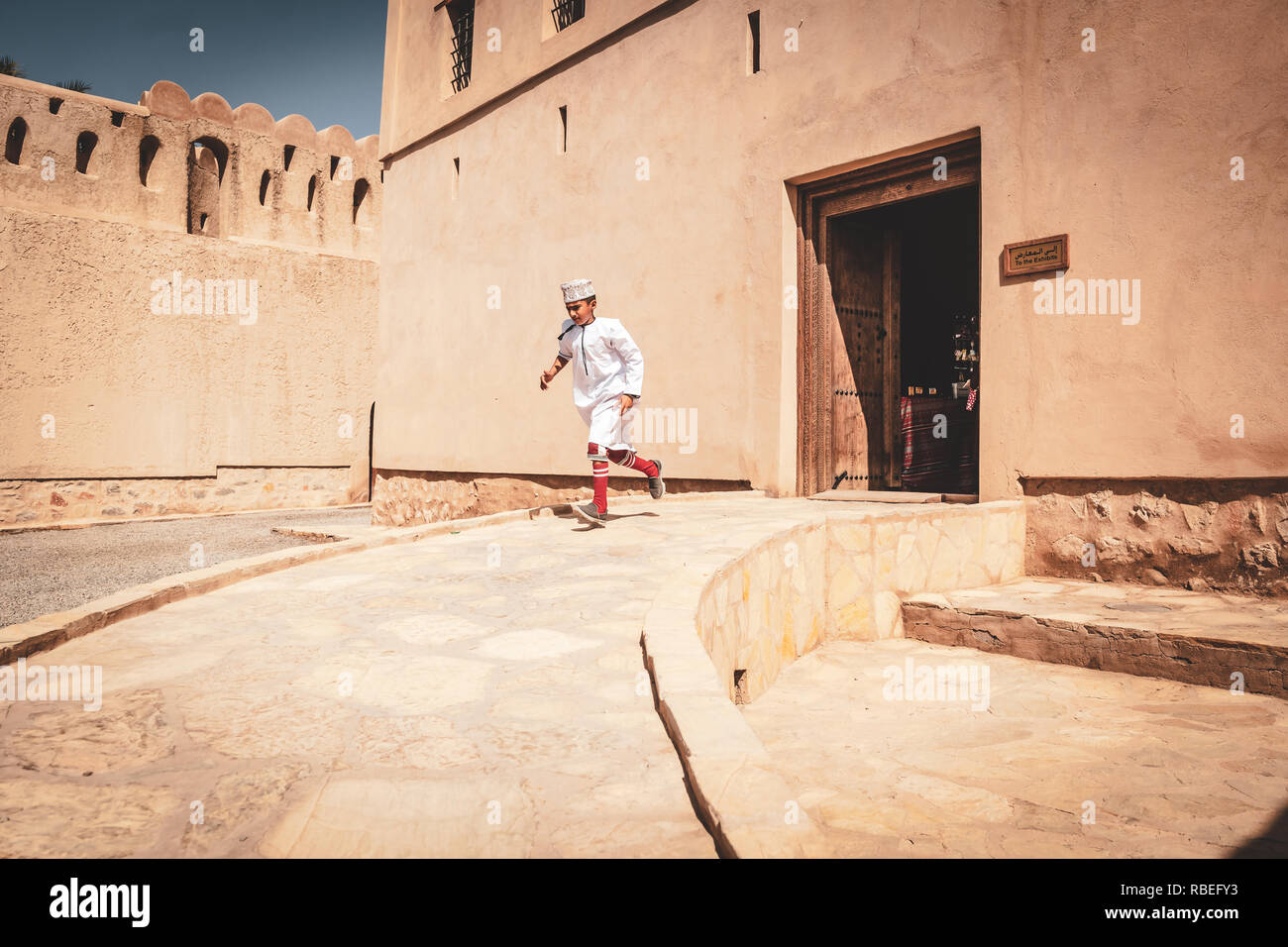 Candid portrait of a cute omani kid in Nizwa Stock Photo - Alamy