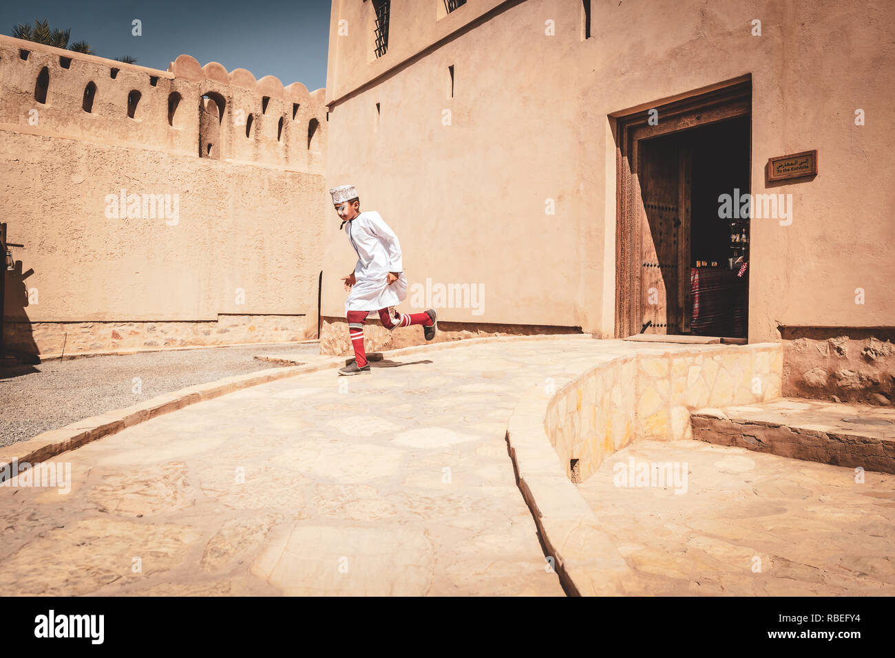 Candid portrait of a cute omani kid in Nizwa Stock Photo - Alamy