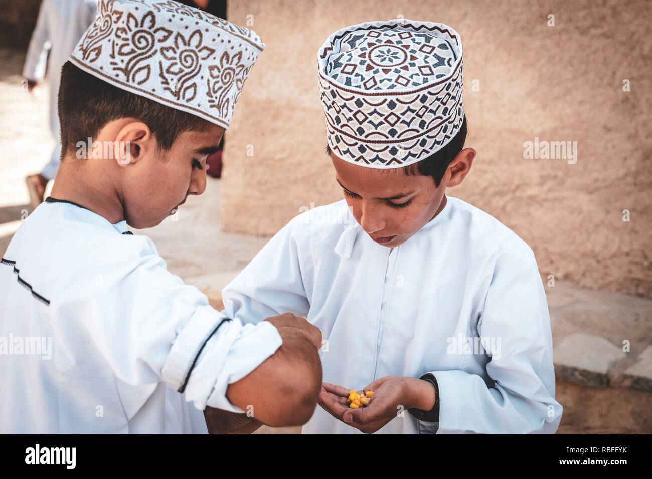 Candid portrait of a cute omani kid in Nizwa Stock Photo - Alamy