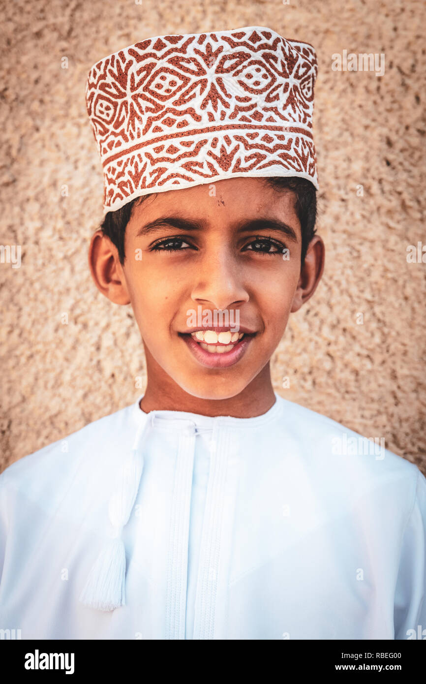 Candid portrait of a cute omani kid in Nizwa Stock Photo - Alamy