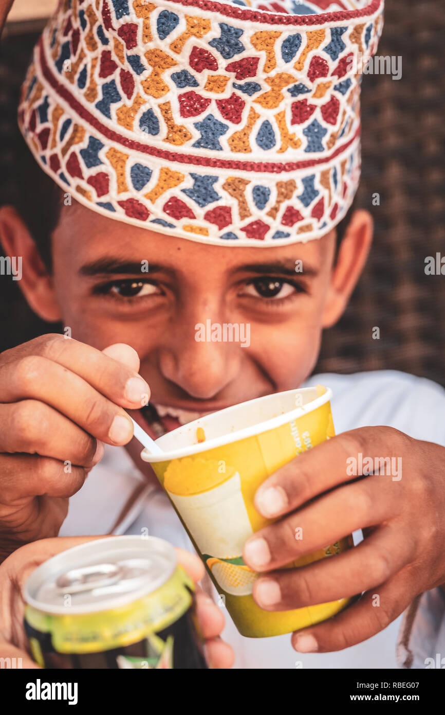 Candid portrait of a cute omani kid in Nizwa Stock Photo - Alamy