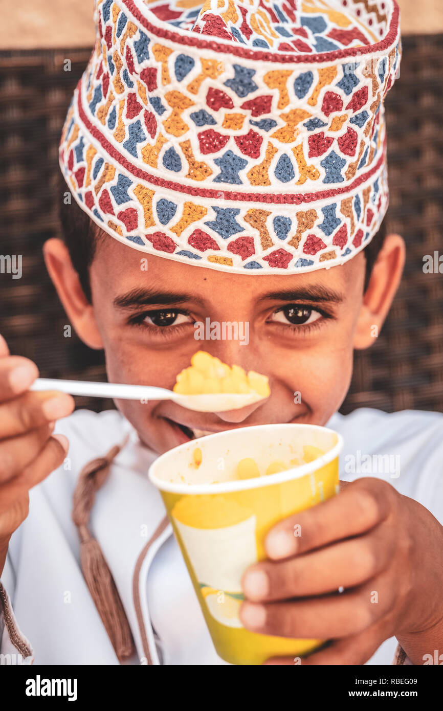 Candid portrait of a cute omani kid in Nizwa Stock Photo - Alamy